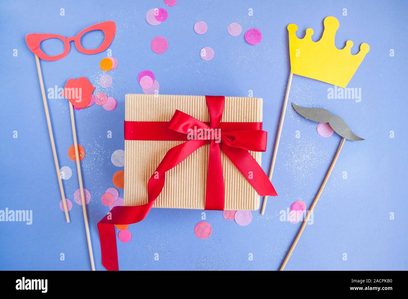 Colorful photo booth props crown, moustaches, glasses and lips on ...