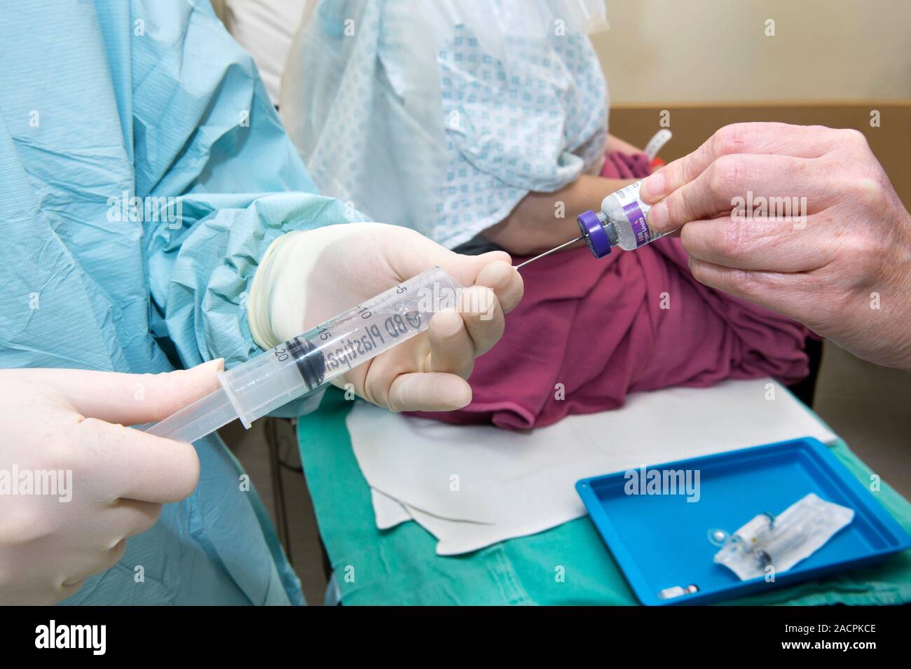 Botox headache treatment. Botox being used to treat a 50-year-old woman ...