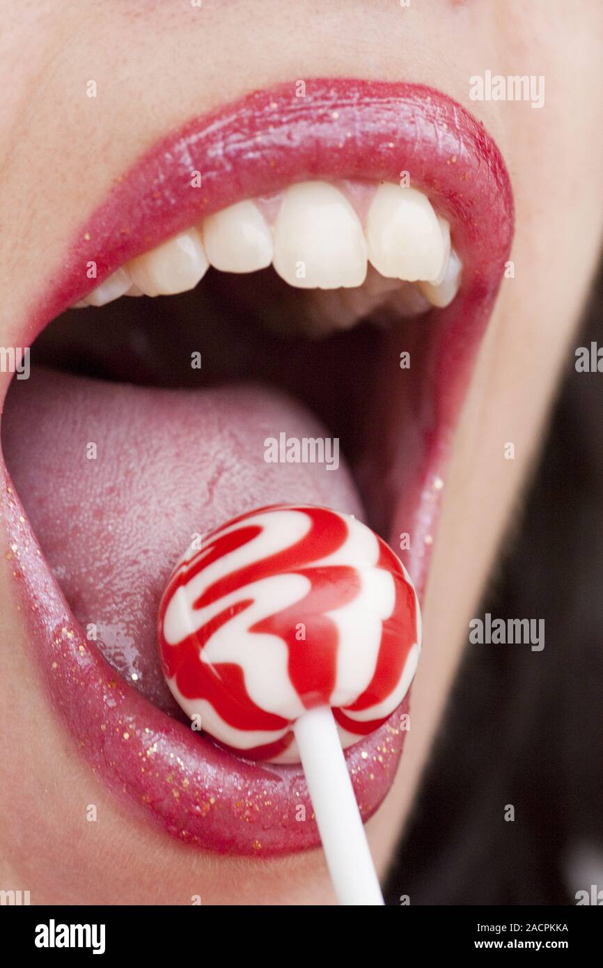 red lips with lollipop Stock Photo - Alamy