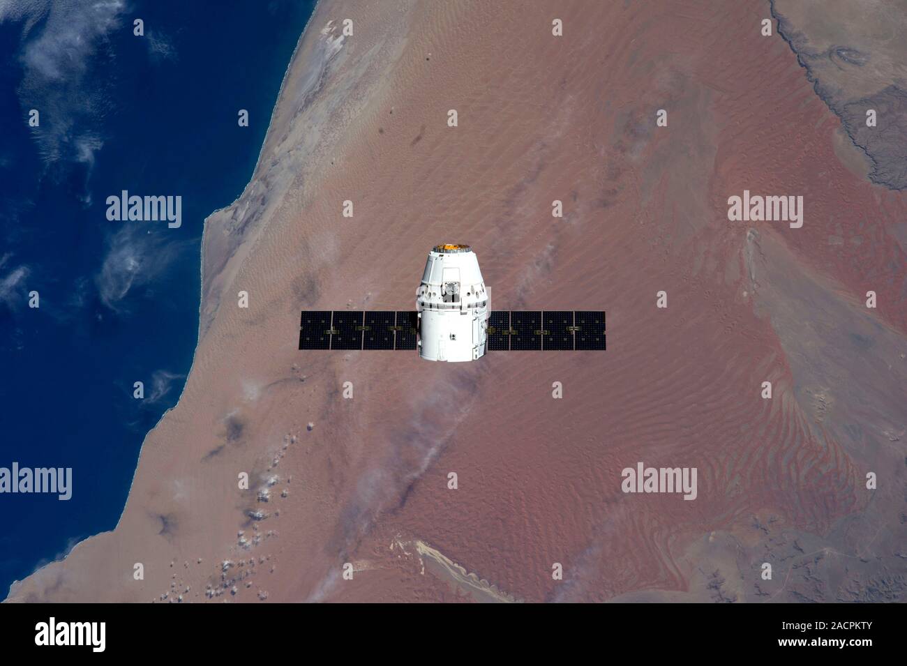 SpaceX Dragon capsule in orbit. View from the International Space ...