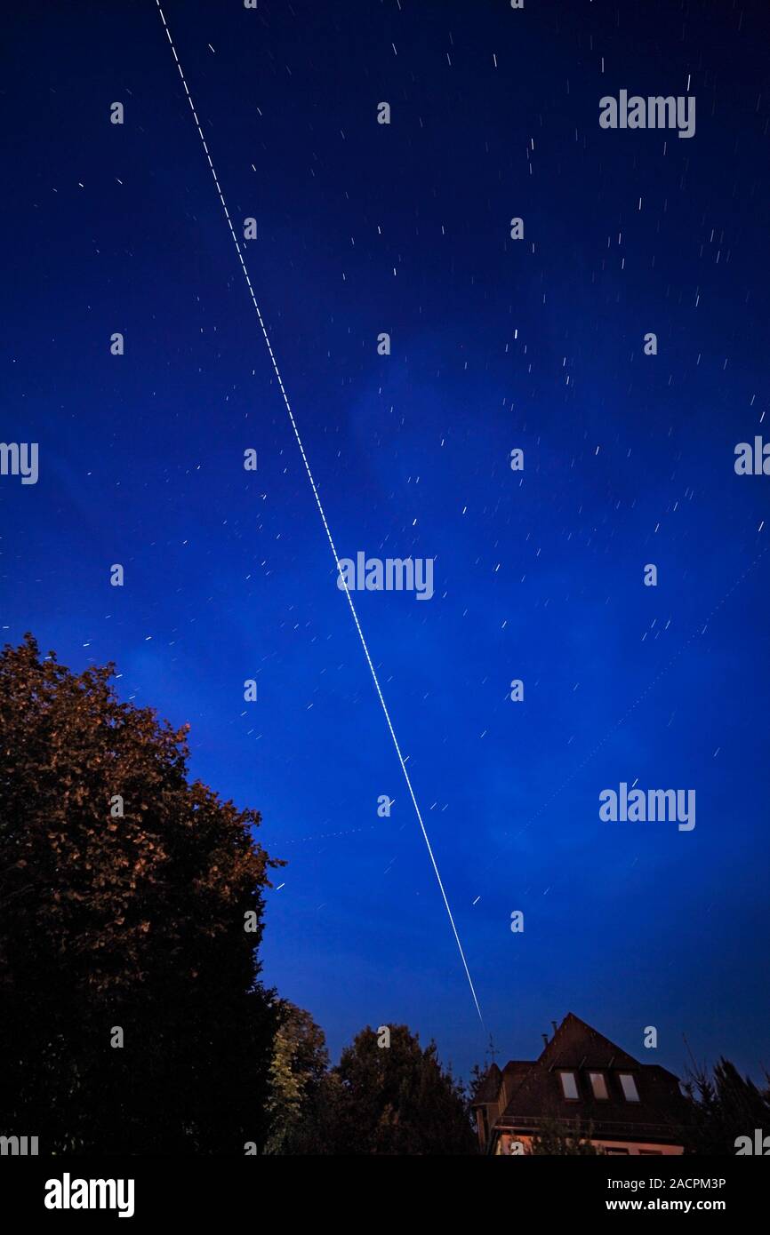 International Space Station in the sky. Time-exposure image showing the ...