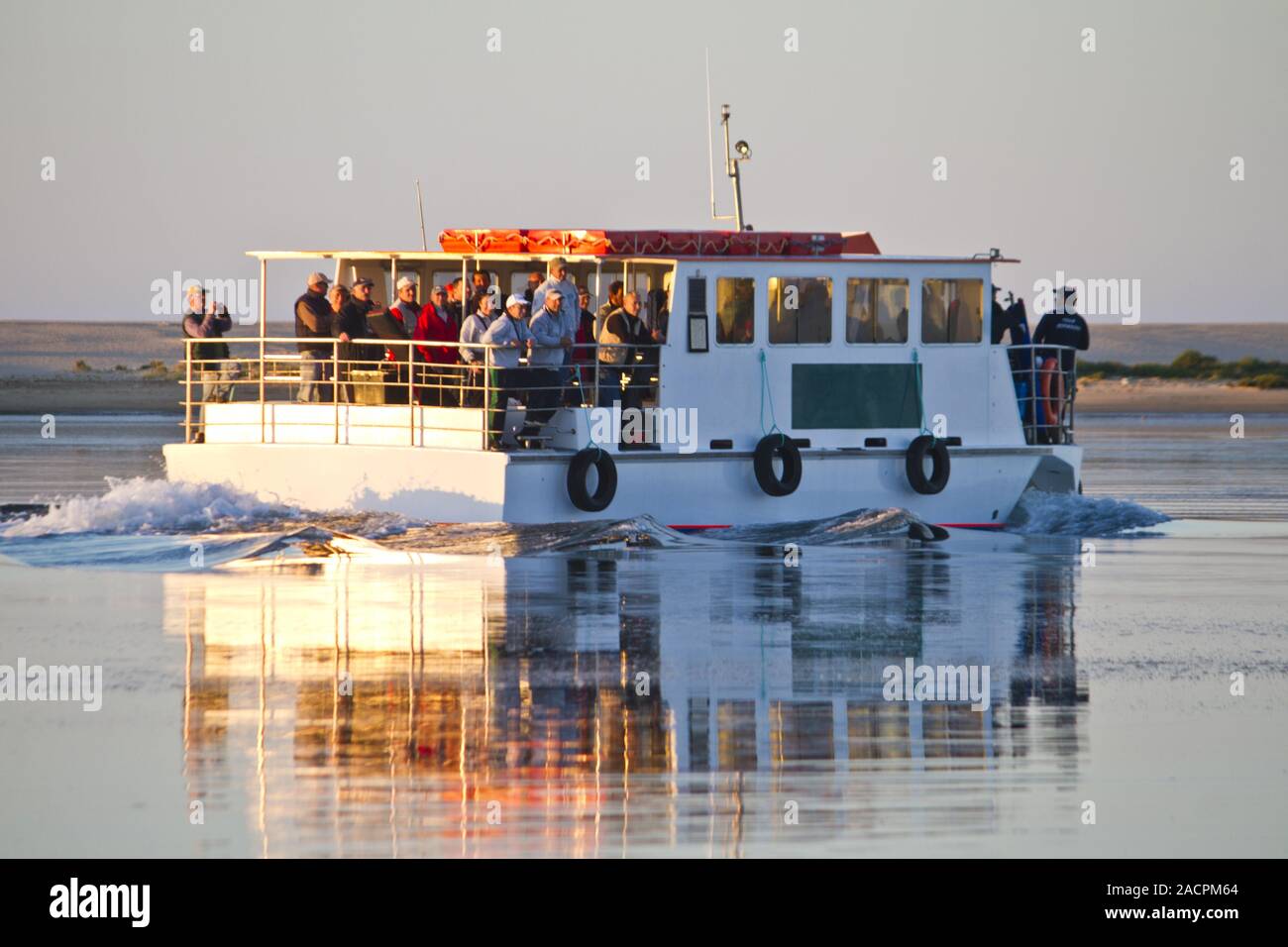 tourist boat crossing the river Stock Photo - Alamy
