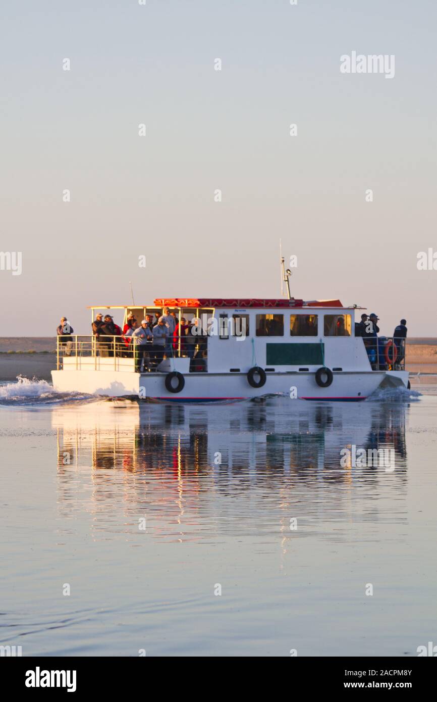 tourist boat crossing the river Stock Photo - Alamy