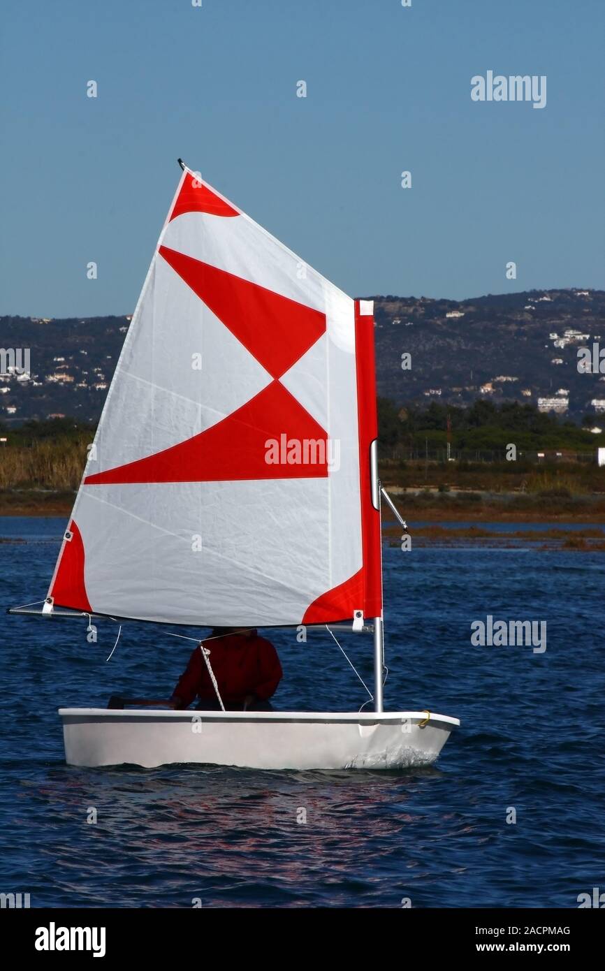 Sailing a small boat Stock Photo - Alamy