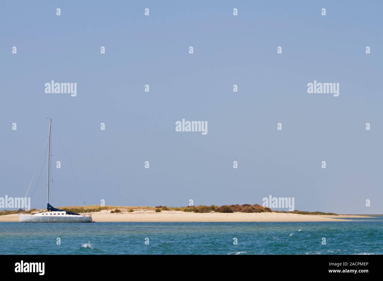 sail boat and deserted island Stock Photo - Alamy
