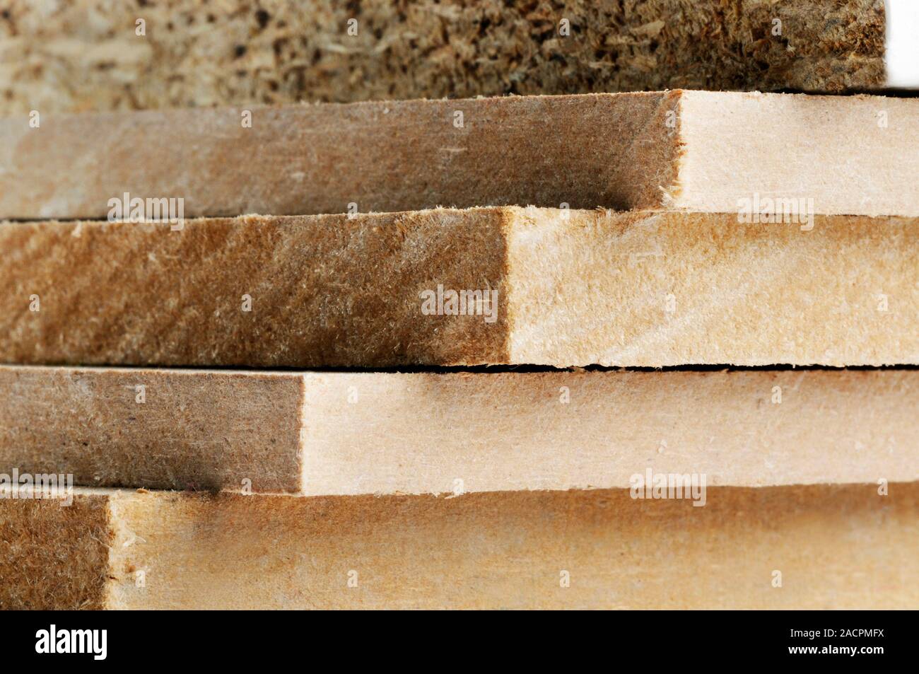 MDF and chipboard. Stack of MDF (medium density fibreboard) and ...