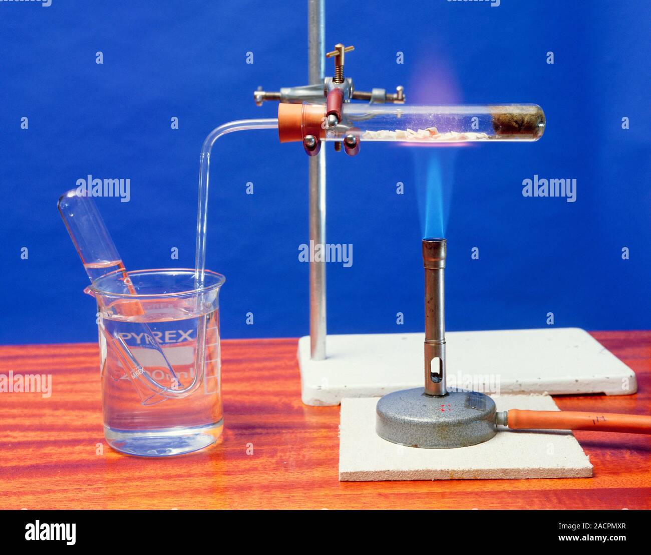 Cracking liquid paraffin. In the horizontal test tube are a piece of ...