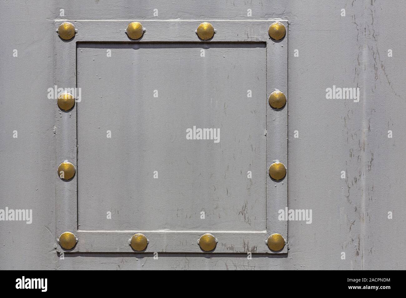 painted iron plate with frame and rivets Stock Photo - Alamy