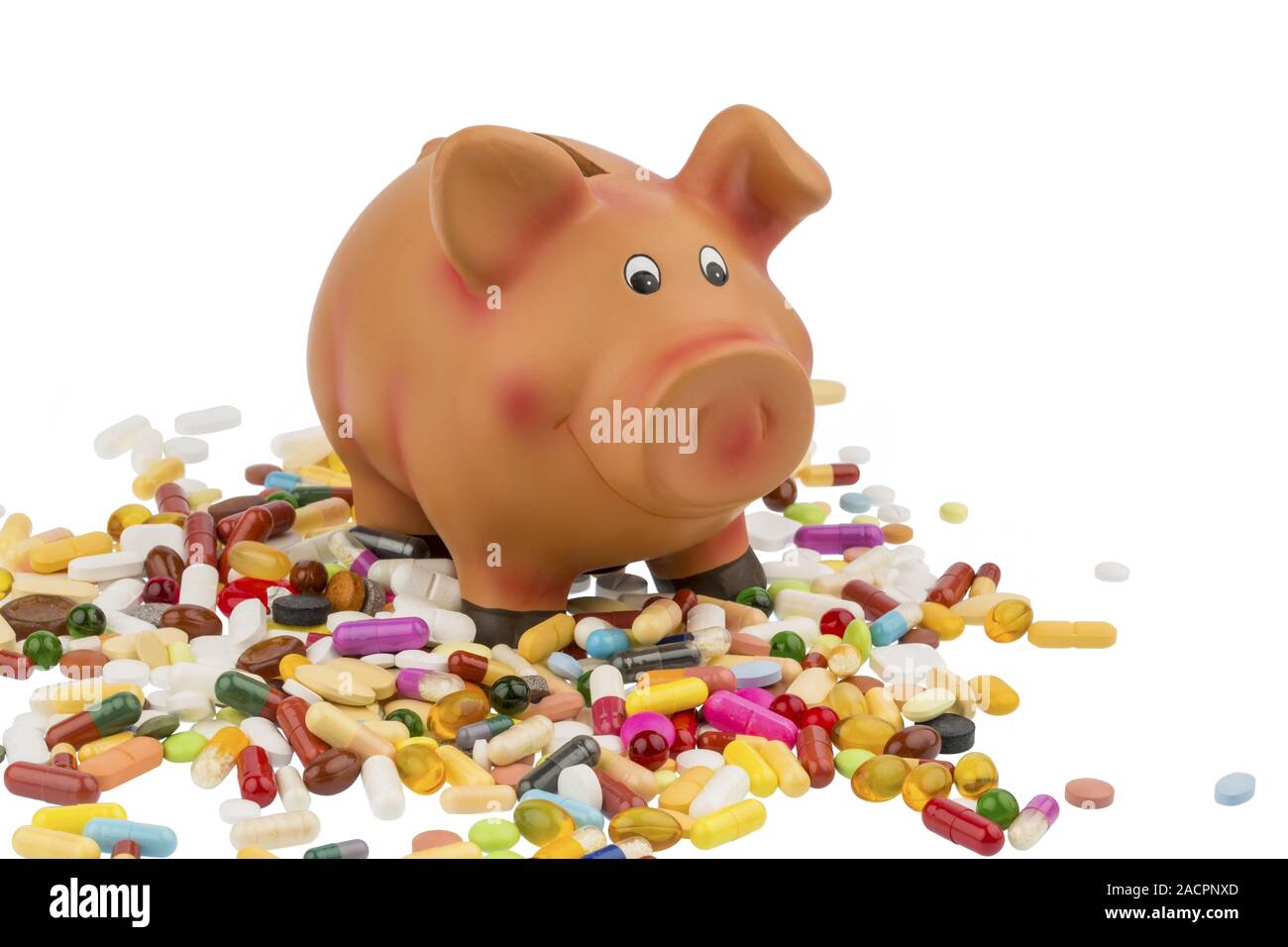 Tablets and piggy banks Stock Photo - Alamy