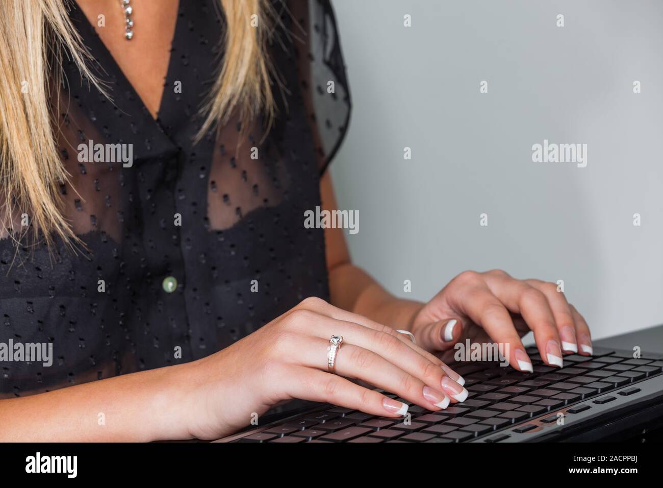 Hands on computer keyboard Stock Photo - Alamy