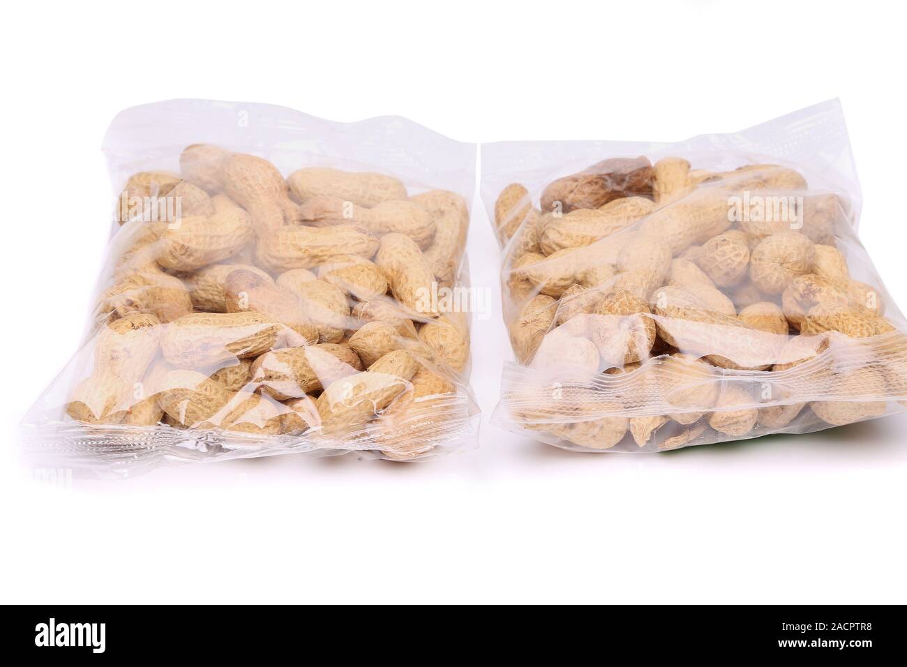 Two large plastic bags of peanuts Stock Photo - Alamy