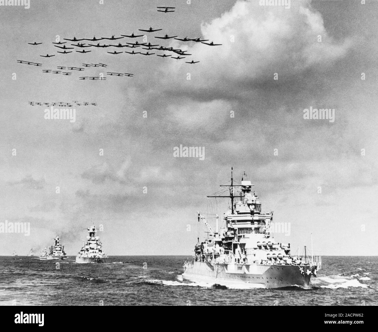 US Navy and aeroplanes, World War II. US Navy cruiser and battleships ...