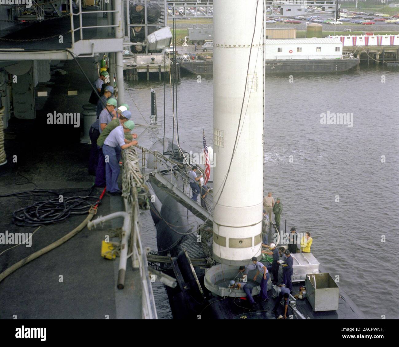 Trident missile preparation. Trident missile being loaded in to a ...