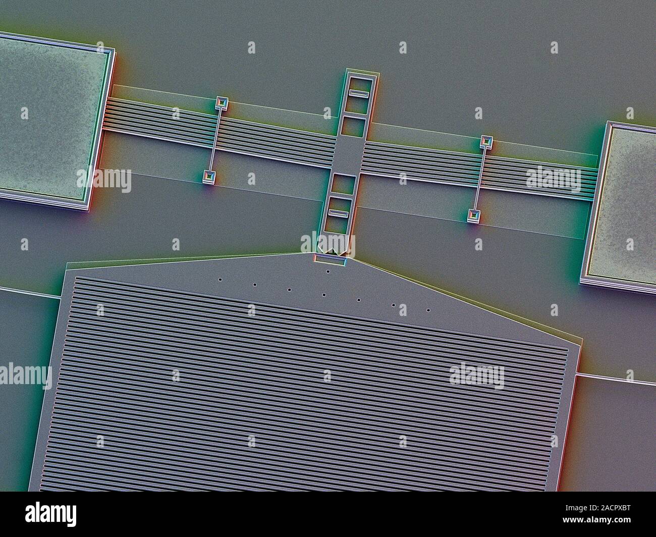 MEMS nanophotonic filter. Coloured scanning electron micrograph of a ...