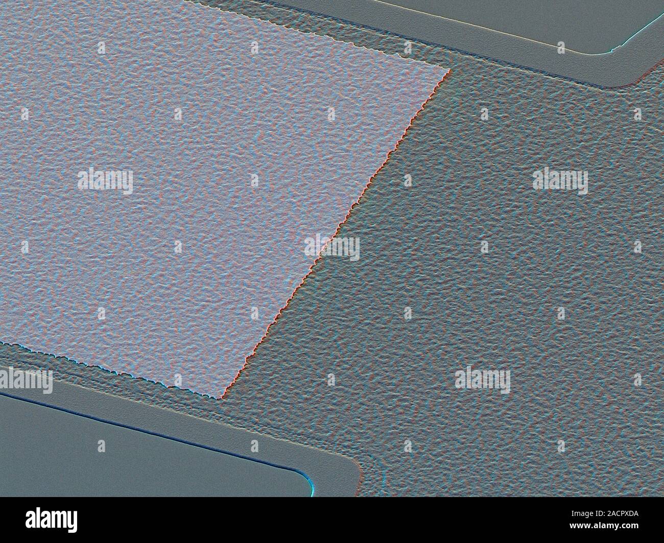 MEMS micro hot-plate. Coloured scanning electron micrograph of a MEMS ...