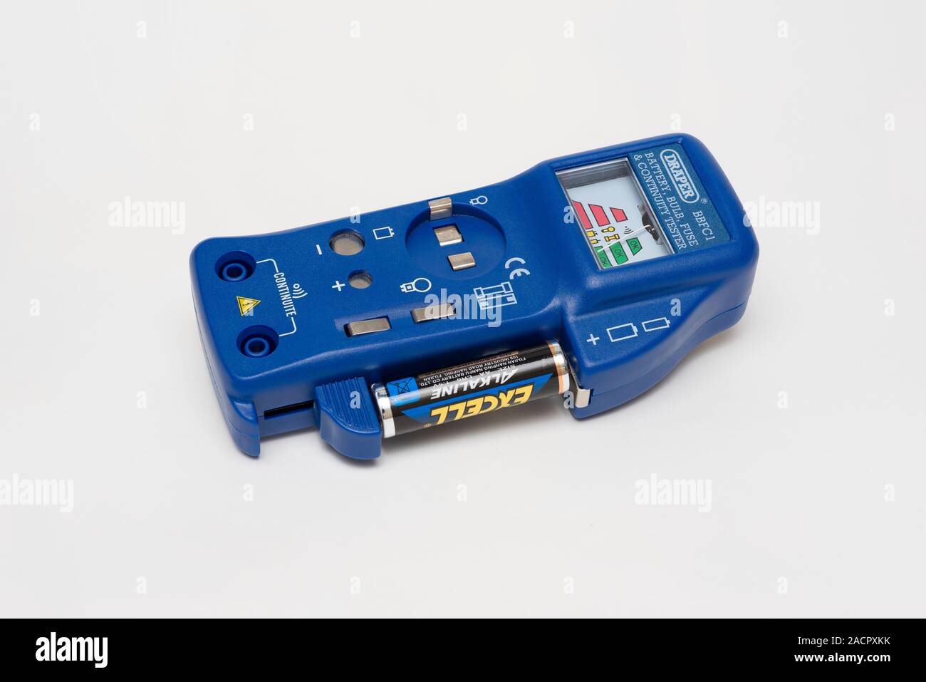 Battery tester. A battery being tested for charge level using a ...