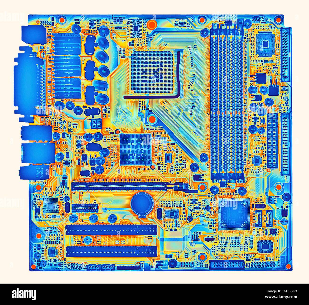 Computer motherboard, coloured x-ray of the main circuit board ...
