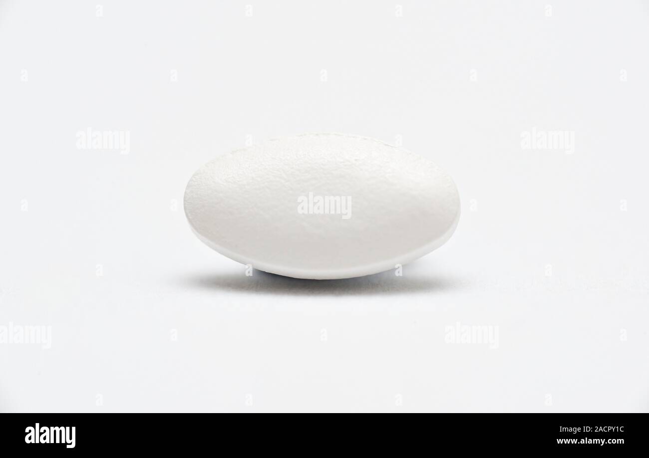 Atorvastatin tablet, a statin drug used to lower cholesterol levels ...