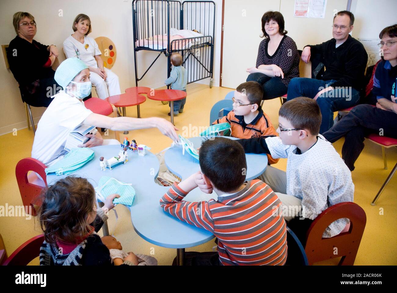 Paediatric surgery information session. Surgeon explaining surgery to ...