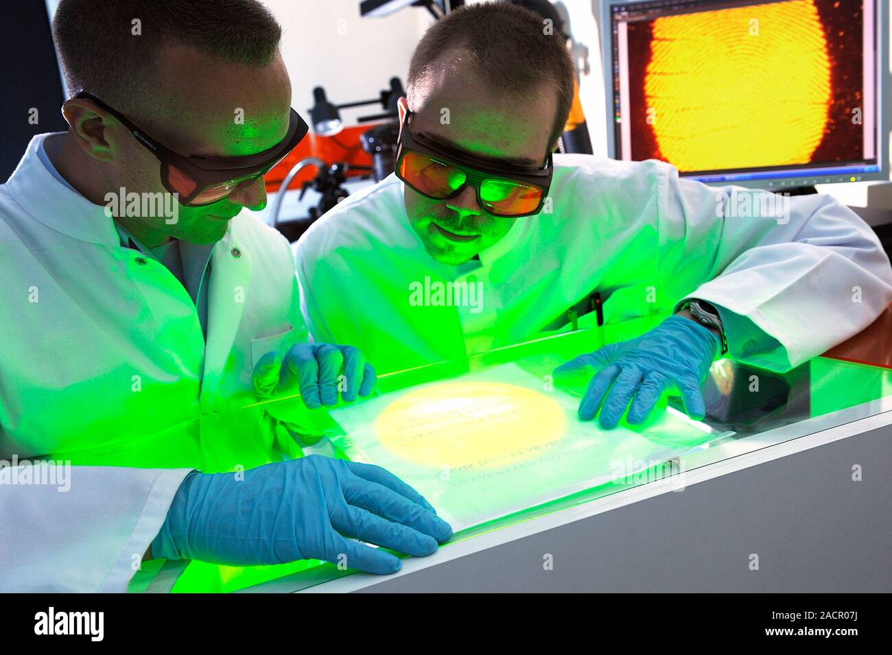 Fingerprint research. Scientists working on a method of viewing ...
