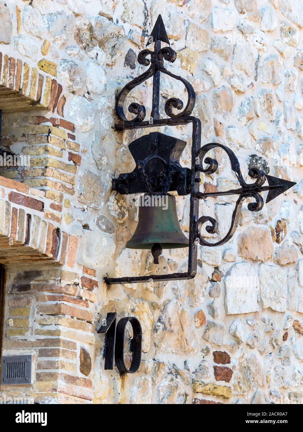 Bell on a house wall Stock Photo - Alamy