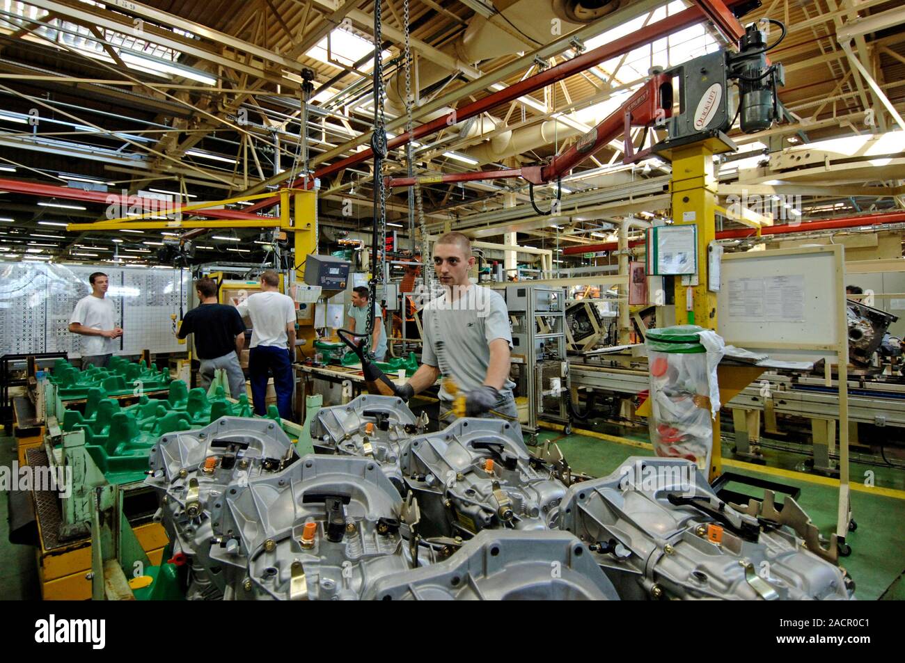 Car spare parts factory. Workers in the Renault spare parts factory ...