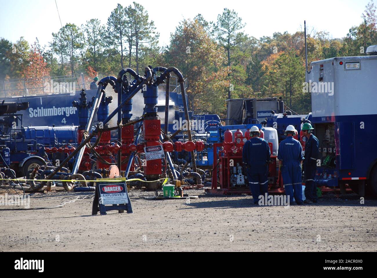 Fracking well heads. Four well heads at a drill pad being used in a ...