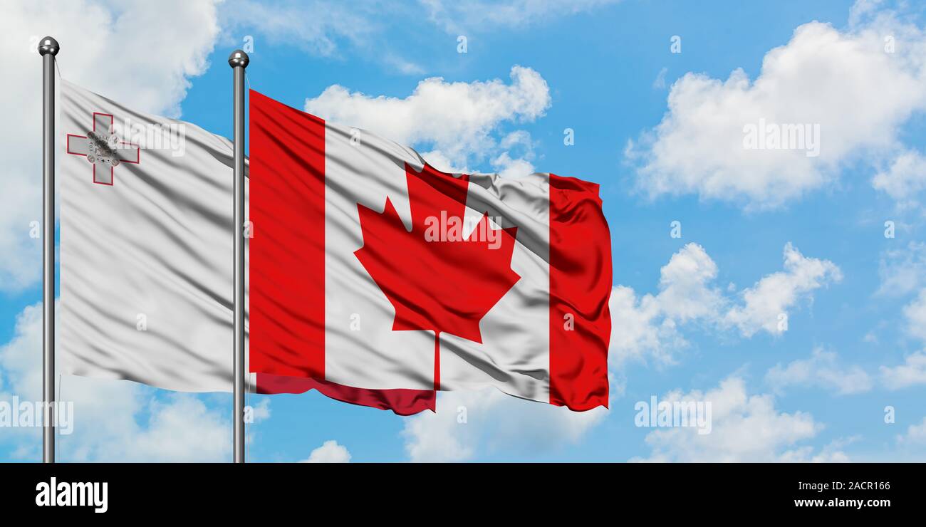 Malta and Canada flag waving in the wind against white cloudy blue sky ...