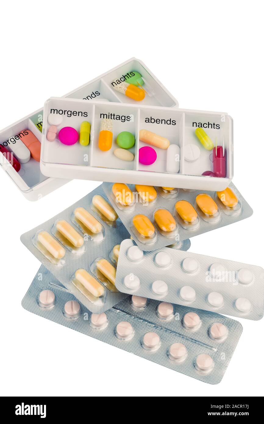 Tablet dispensers and tablets Stock Photo - Alamy