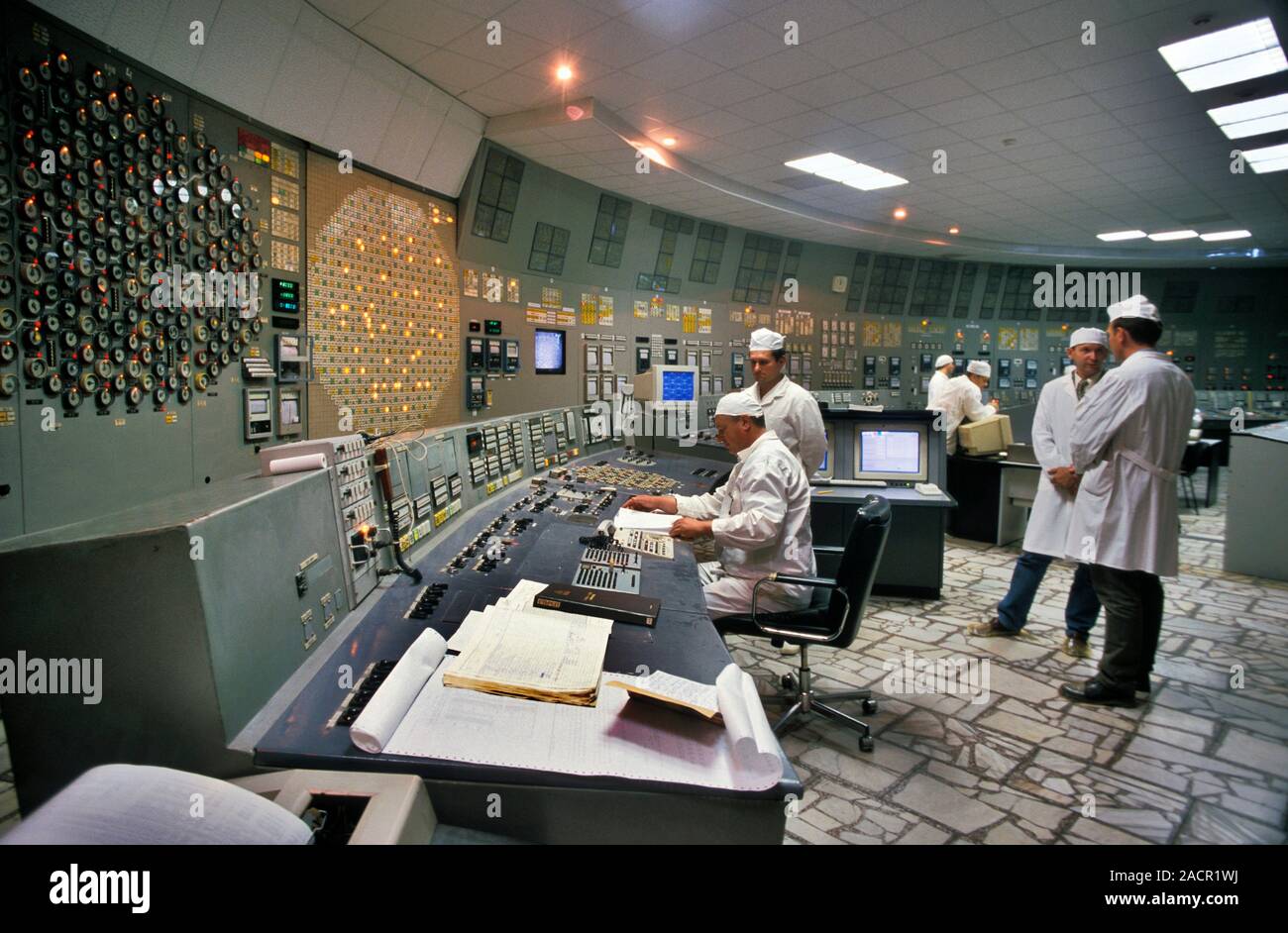 Chernobyl reactor 3 control room. Worker sat at the control panel of ... Chernobyl reactor 3 control room. Worker sat at the control panel of ...
