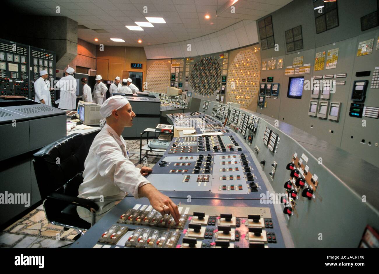 Chernobyl reactor 3 control room. Worker sat at the control panel of ... Chernobyl reactor 3 control room. Worker sat at the control panel of ...
