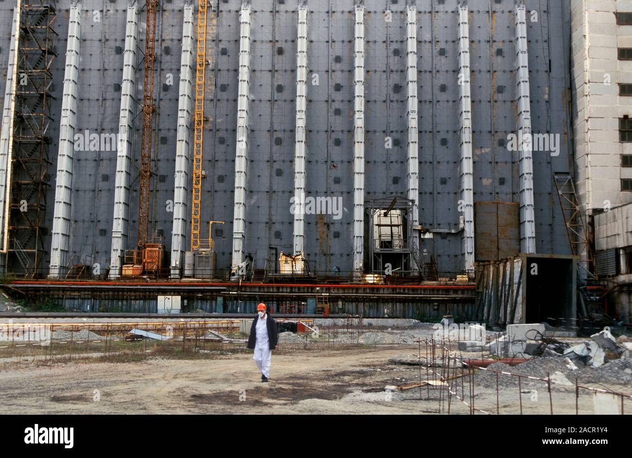 Chernobyl disaster shelter maintenance. Worker inside the Object ...