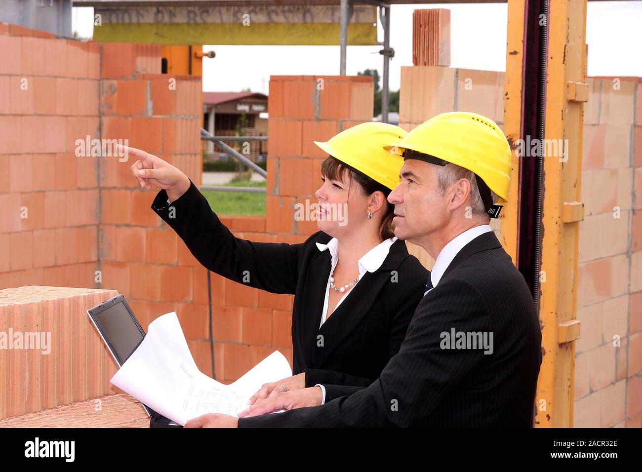 Architects on the construction site Stock Photo - Alamy