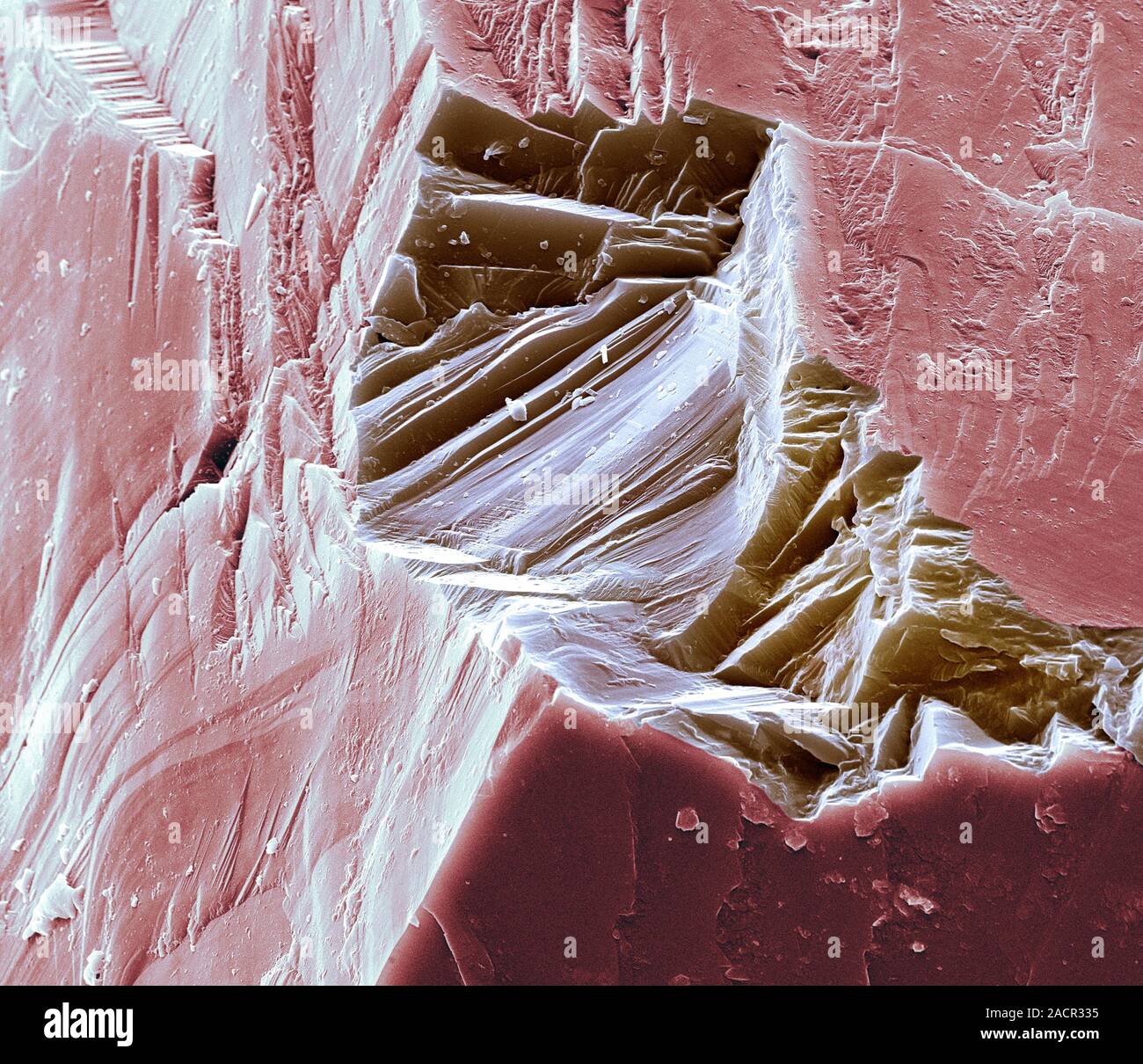 Crushed diamond. Coloured scanning electron micrograph (SEM) showing ...