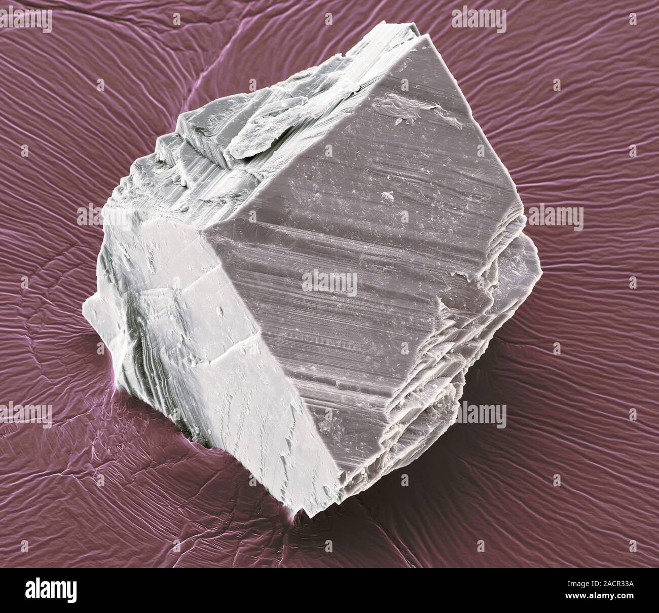 Crushed diamond. Coloured scanning electron micrograph (SEM) of a ...