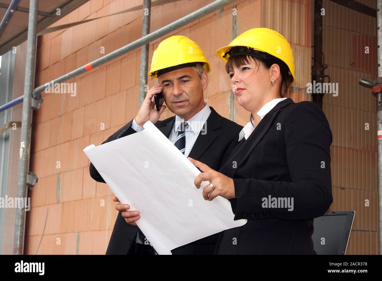 Architects on the construction site Stock Photo - Alamy