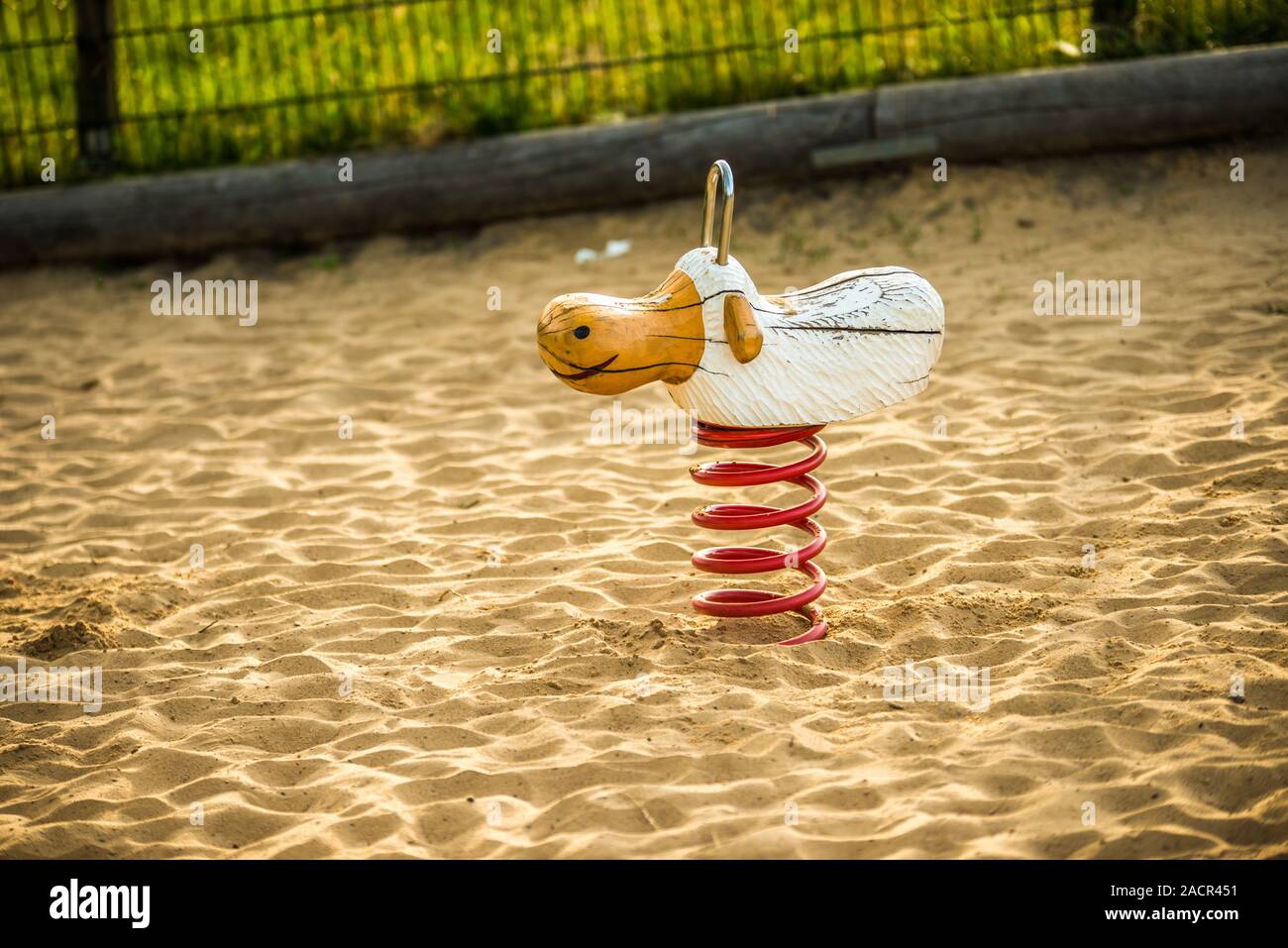 wooden spring animal in Berlin Stock Photo - Alamy