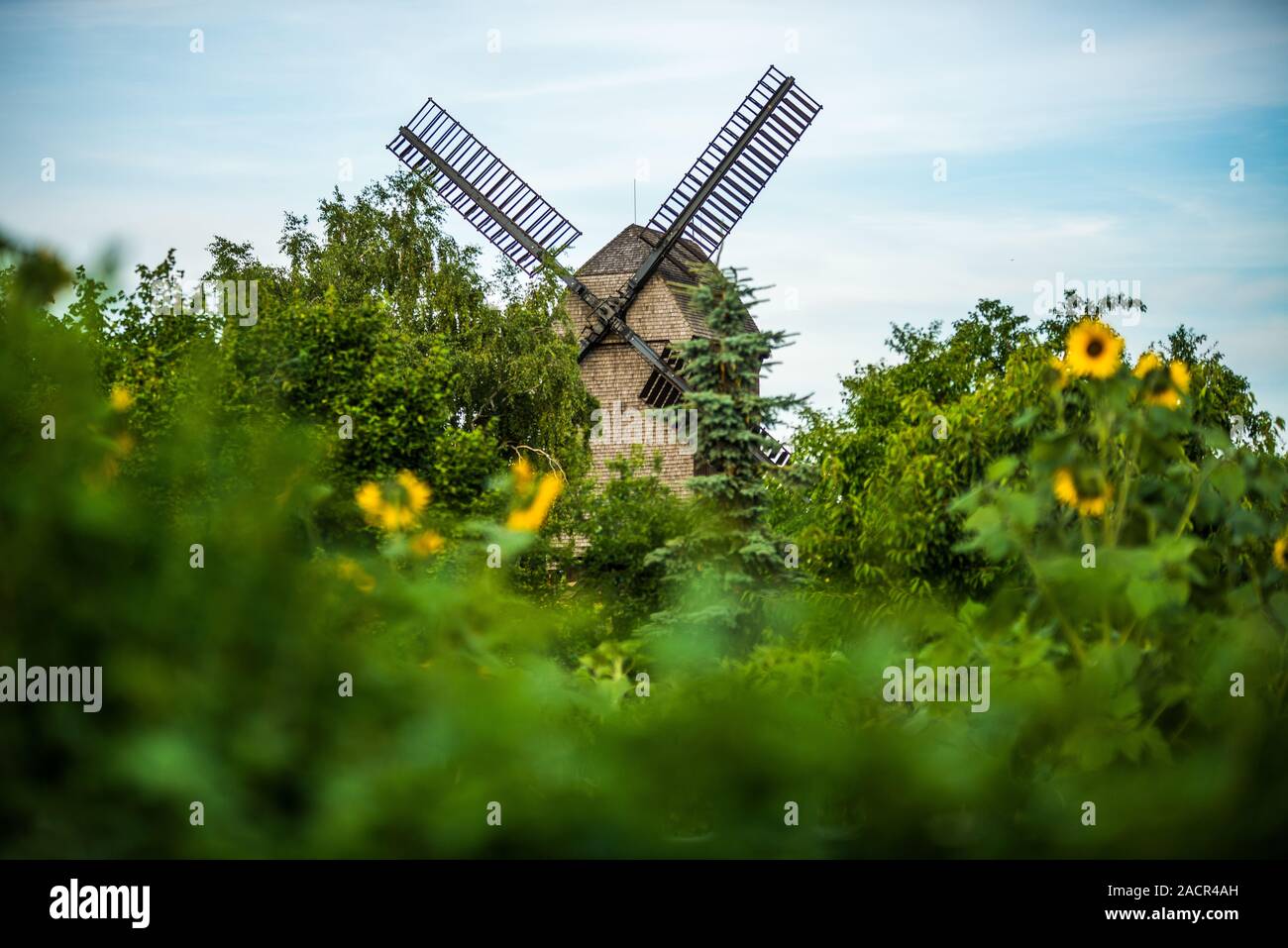 big brown windmill in Berlin Stock Photo - Alamy