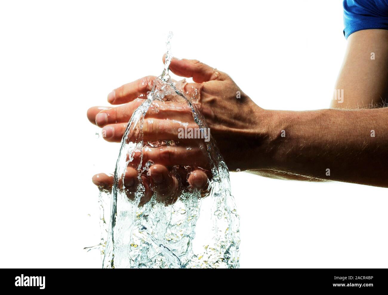 Washing hands in water, high-speed photograph Stock Photo - Alamy