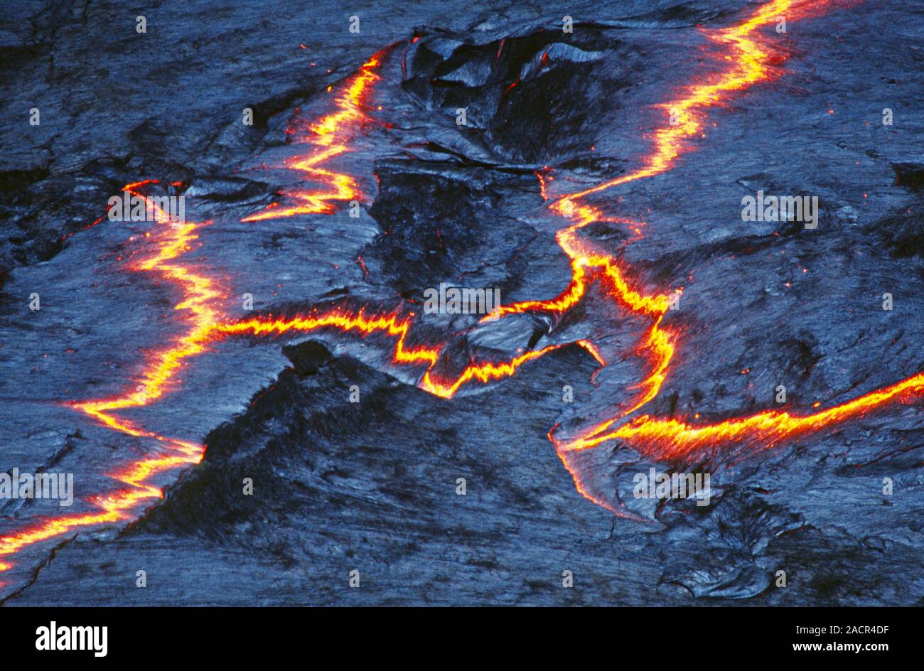Lava lake volcanic fissures. Glowing pattern of fissures in the crust ...