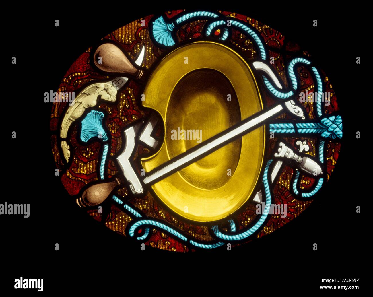 Oval shaped design featuring surgical instruments and a decorative blue ...