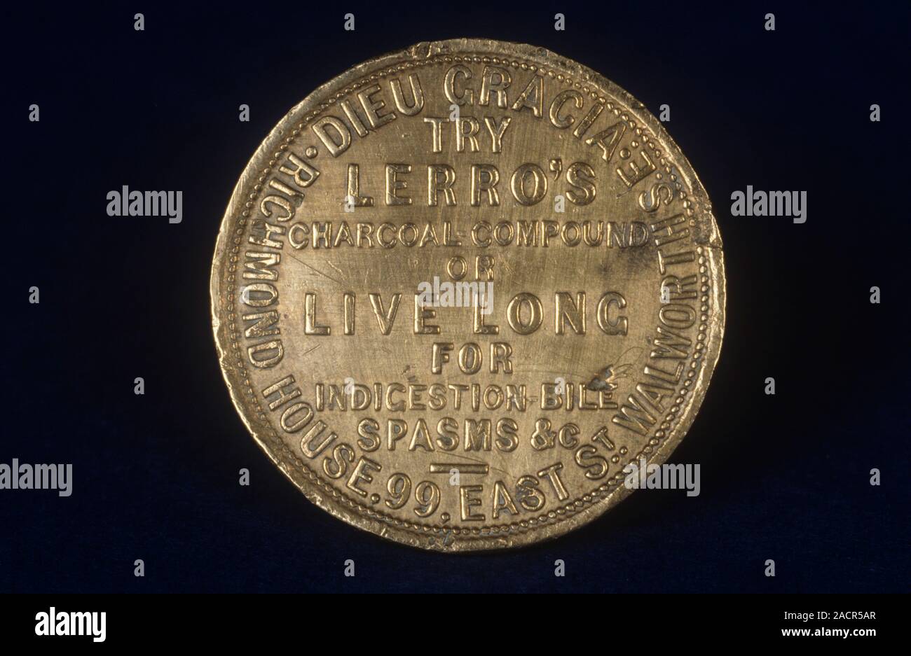 Metal token for Lerro's Charcoal Compound. Charcoal compound was used ...