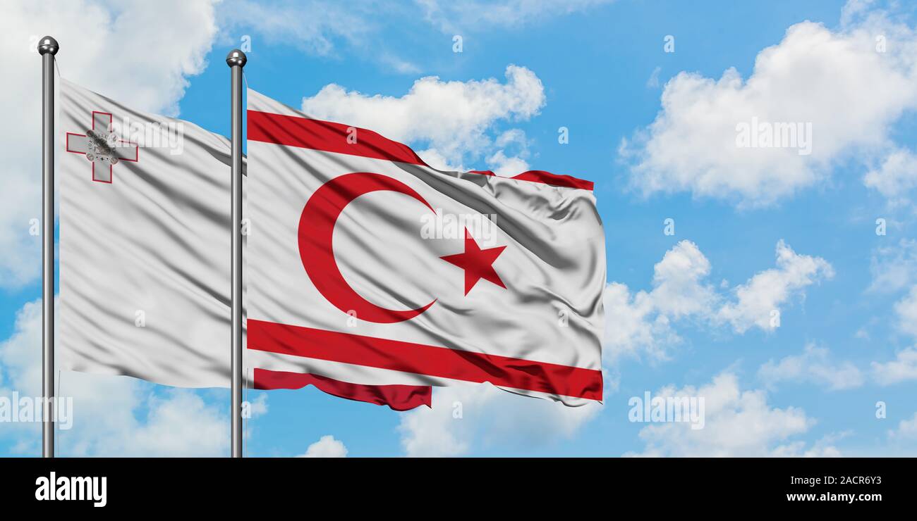 Malta and Northern Cyprus flag waving in the wind against white cloudy ...