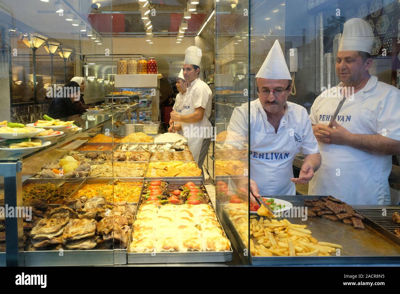 Staff serving authentic Turkish food in Pehlivan Restaurant in Istiklal ...