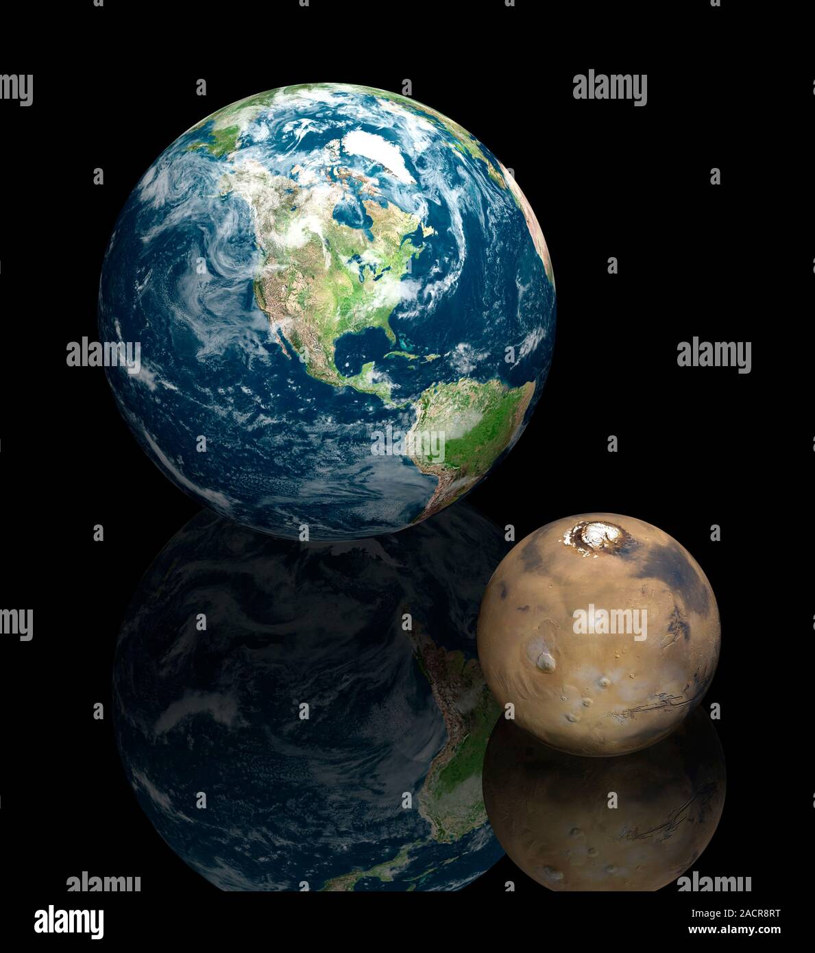 Mars and Earth. Computer artwork comparing the size of the planet Mars ...