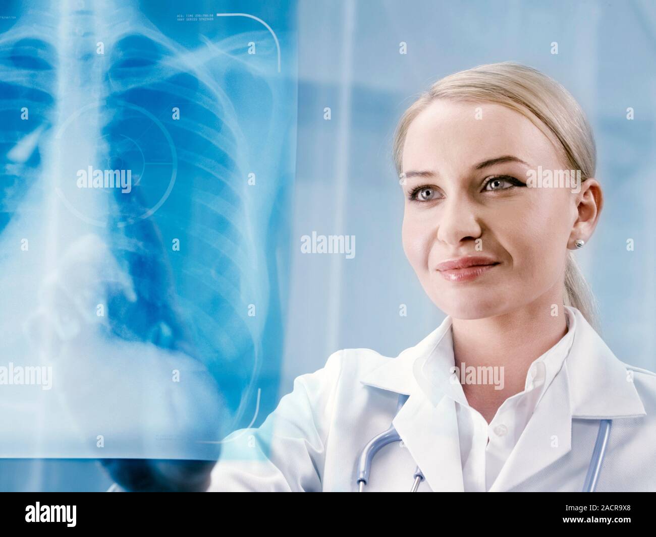 Doctor studying an X-ray Stock Photo - Alamy
