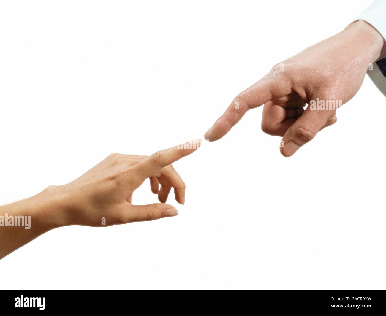 Outstretched fingers of male and female hands touching Stock Photo - Alamy