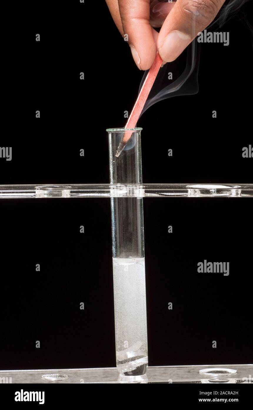 Lit splint test for hydrogen gas. Lit splint after being placed in a ...
