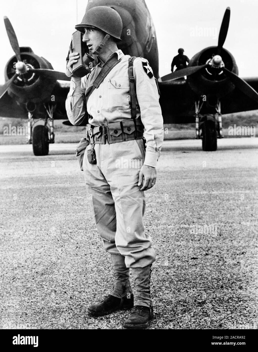 Military portable radio. US Army officer using a 'walkie-talkie', a ...