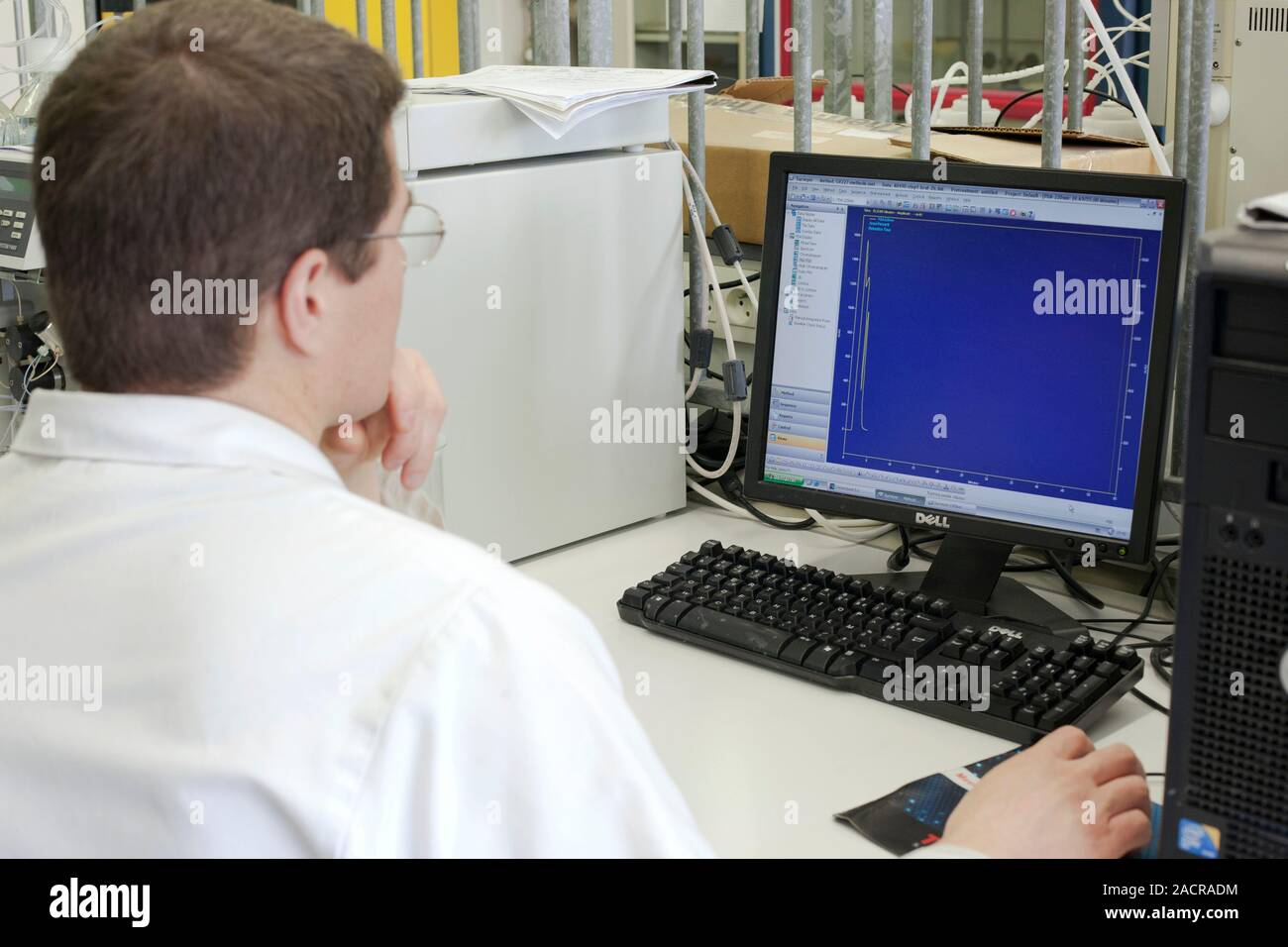 Bio-organic chemistry lab. Scientist analysing samples at the COBRA Bio ...
